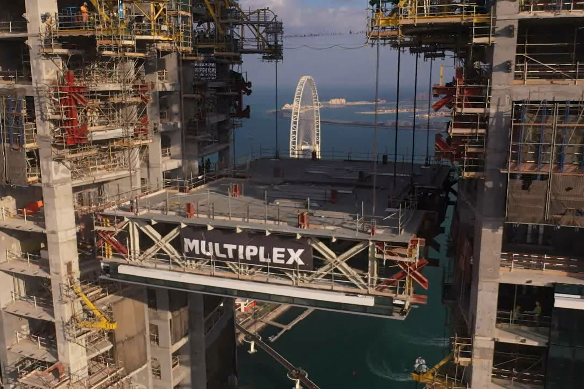 Watch as The Address Jumeirah Gate install upper bridge section | News ...